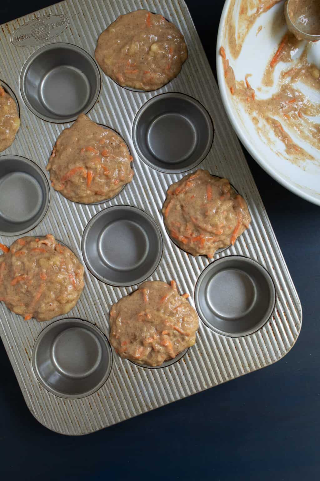 Simple Bakery Style Banana Carrot Muffins | Plan. Eat. Post. Repeat.